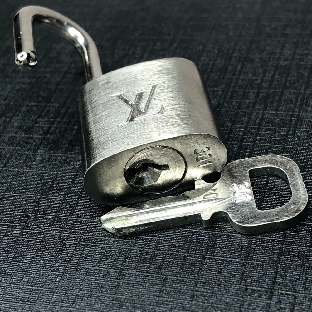Louis Vuitton | Accessories | Louis Vuitton Palladium Lock And Key ...